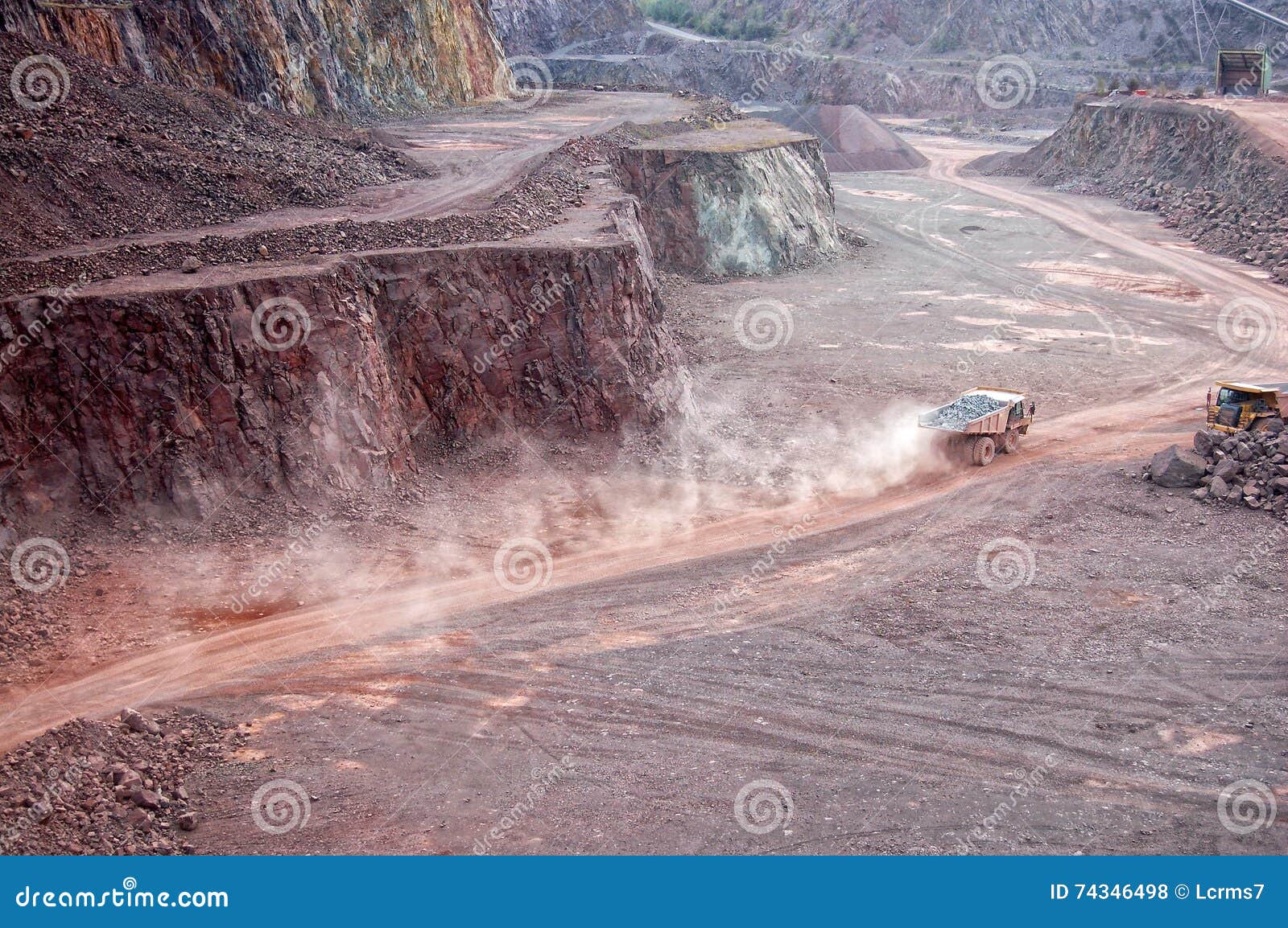 Dumper Truck Driving Along in Quarry Mine Pit Stock Photo - Image of ...