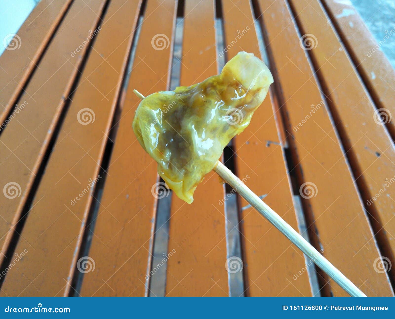 A Dumpling on a stick. stock photo. Image of dumpling - 161126800