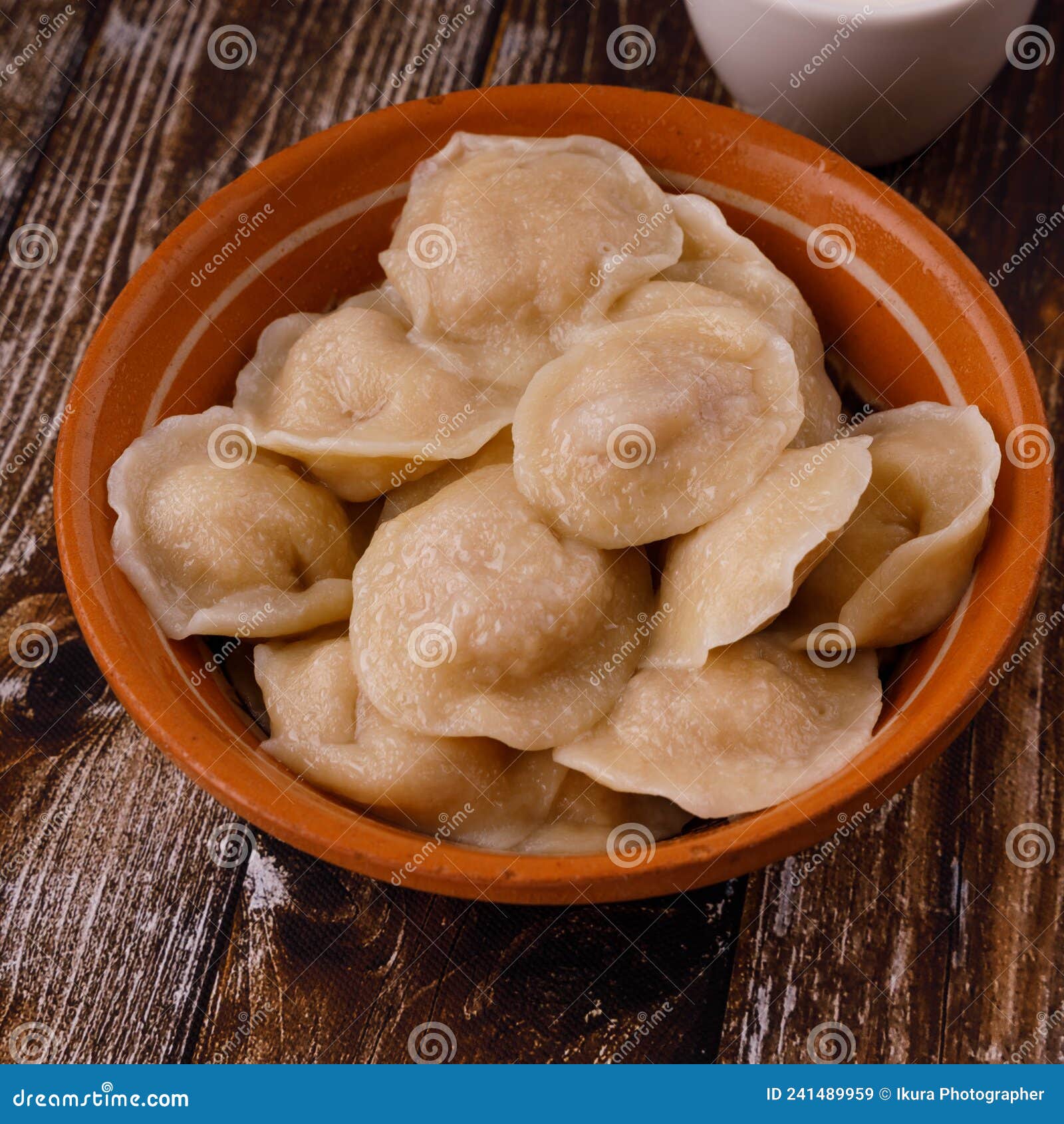 Dumplings in Clay Plate on Wooden Background for Restaurant Menu1 Stock ...