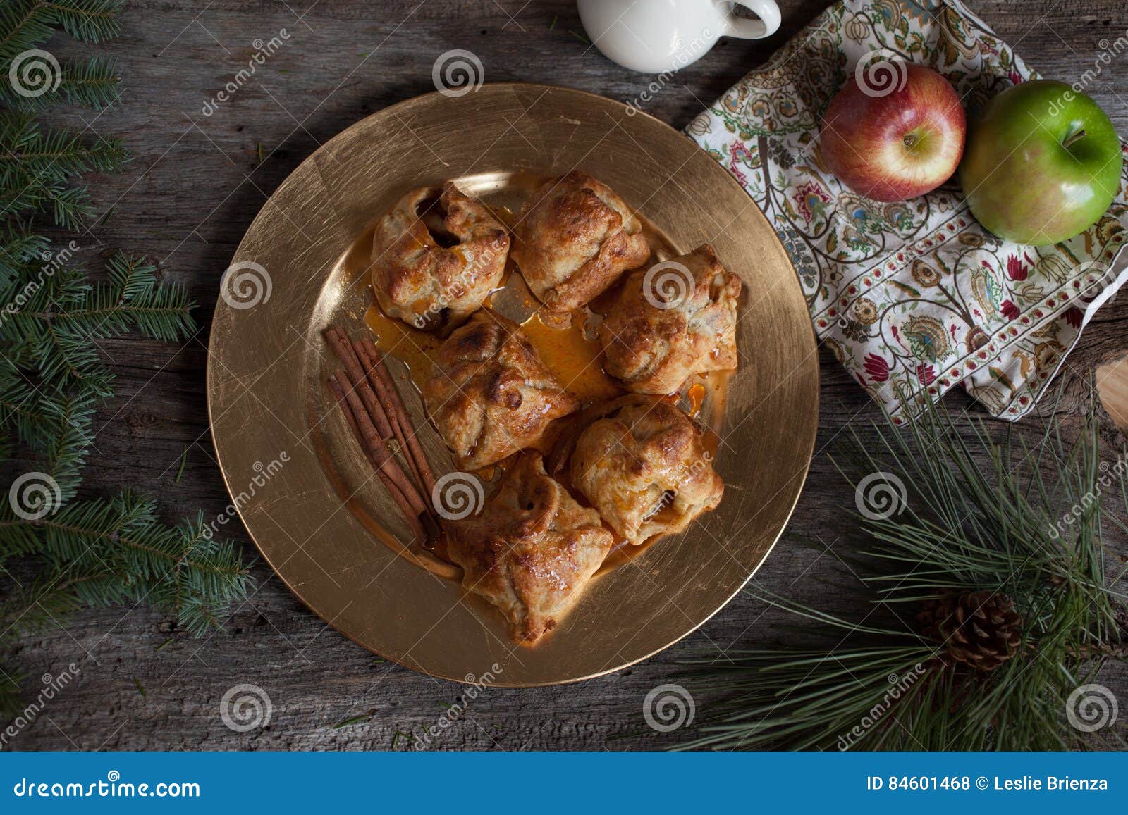 Dumplings on Gold Plate with Greenery on Rustic Wood Stock Photo ...