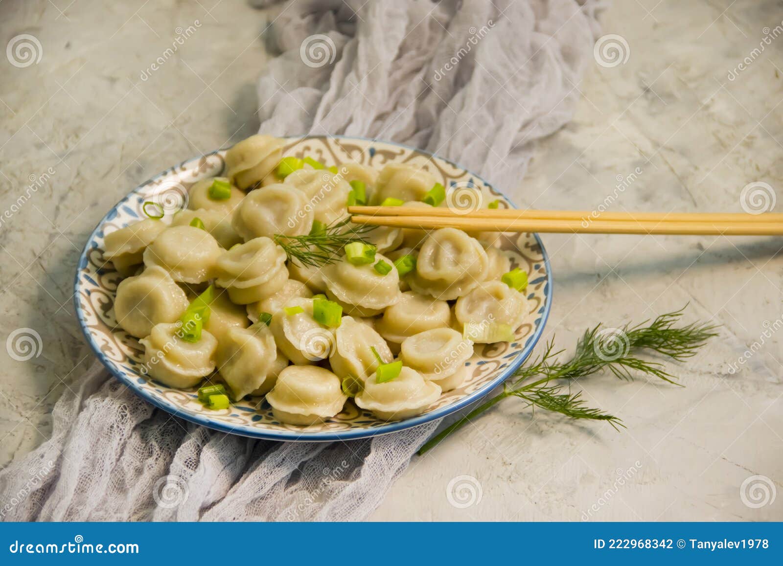 Dumplings, Sticks on Concrete Background Serving Stock Photo - Image of ...