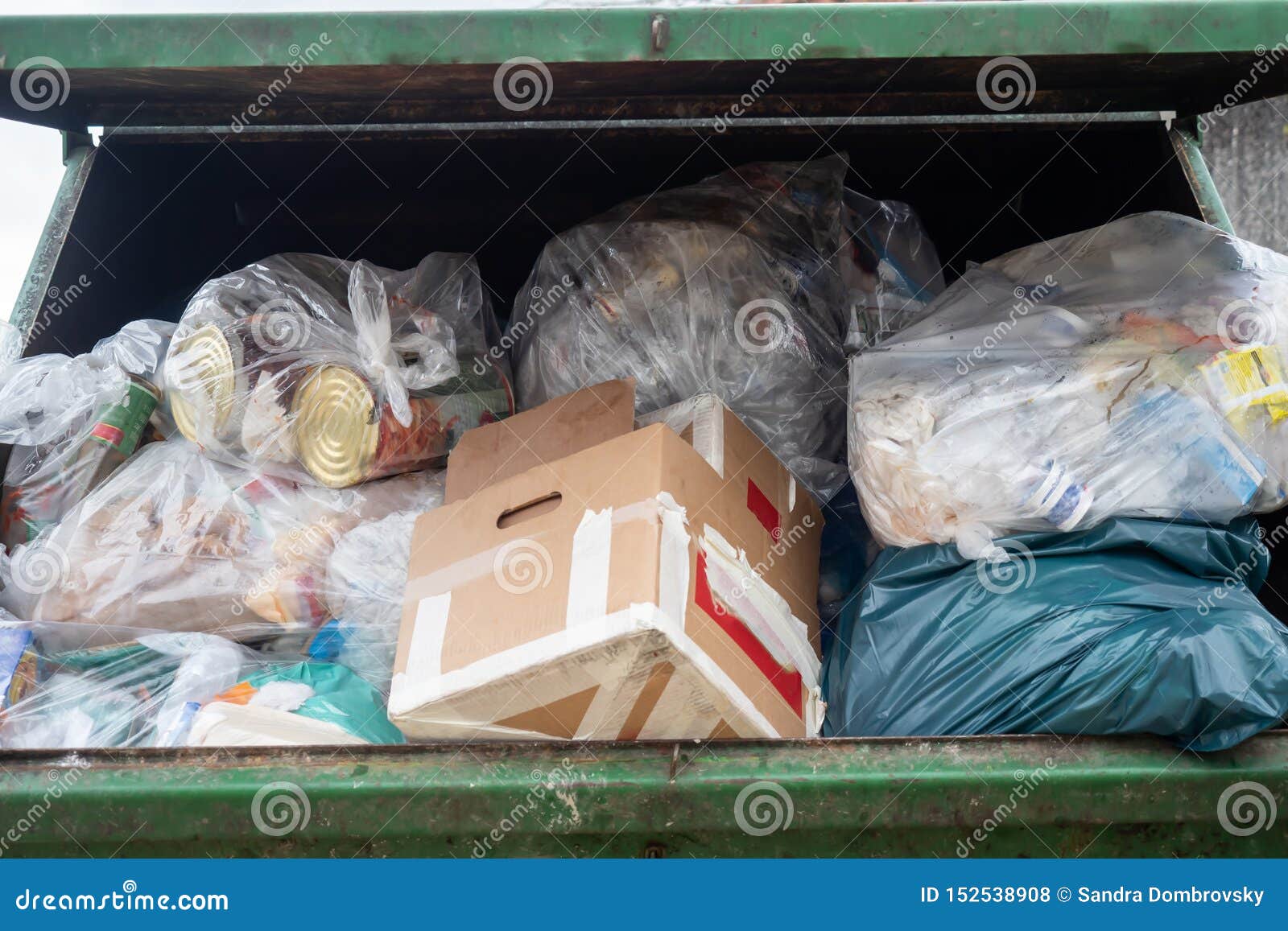 A Dumpster Full of Mixed Garbage Stock Photo - Image of brown, mixed ...