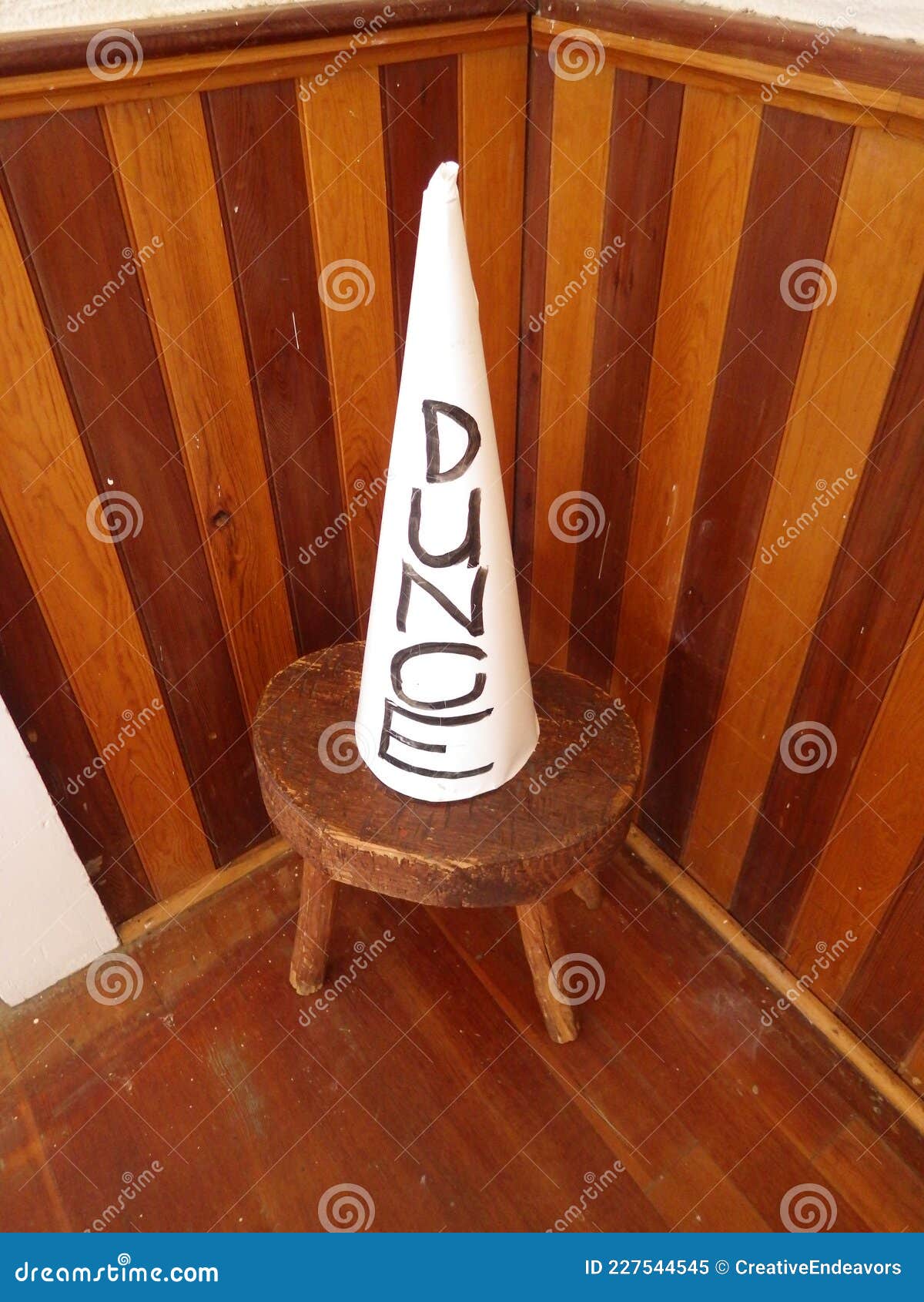 Dunce Cap on Stool in Corner of Room Stock Image - Image of response ...