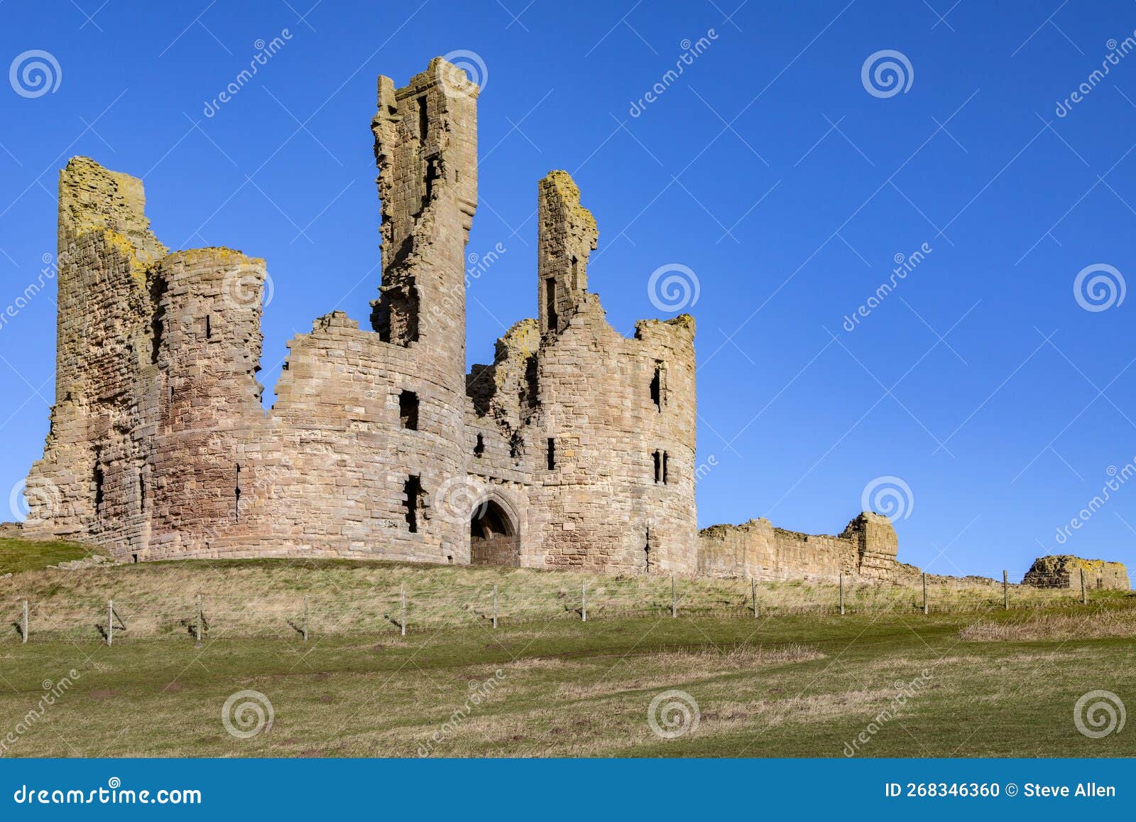 Dunstanburgh Castle - Northumberland - England Stock Photo - Image of ...