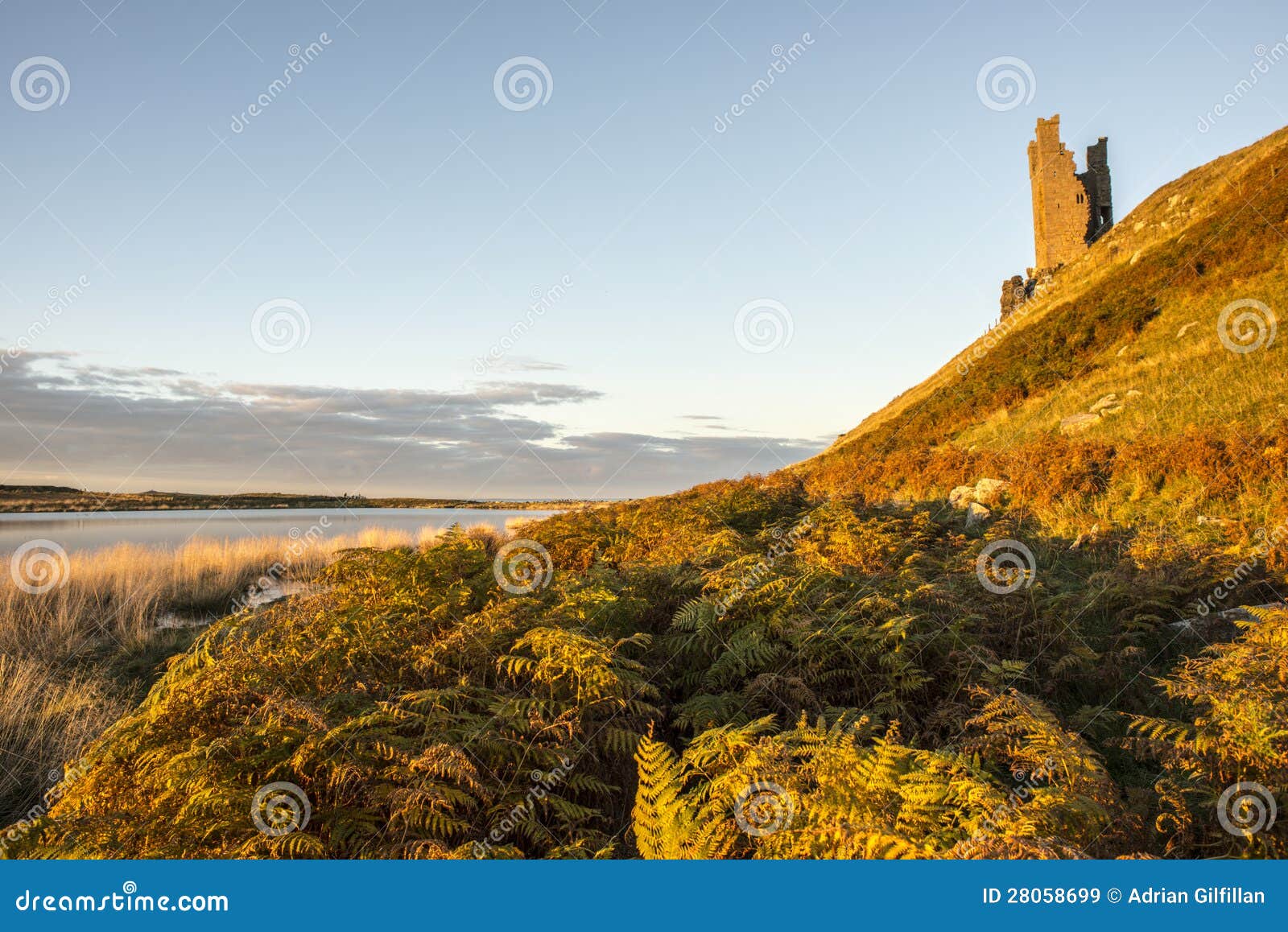 Dunstanburgh castle ruins stock image. Image of scenic - 28058699