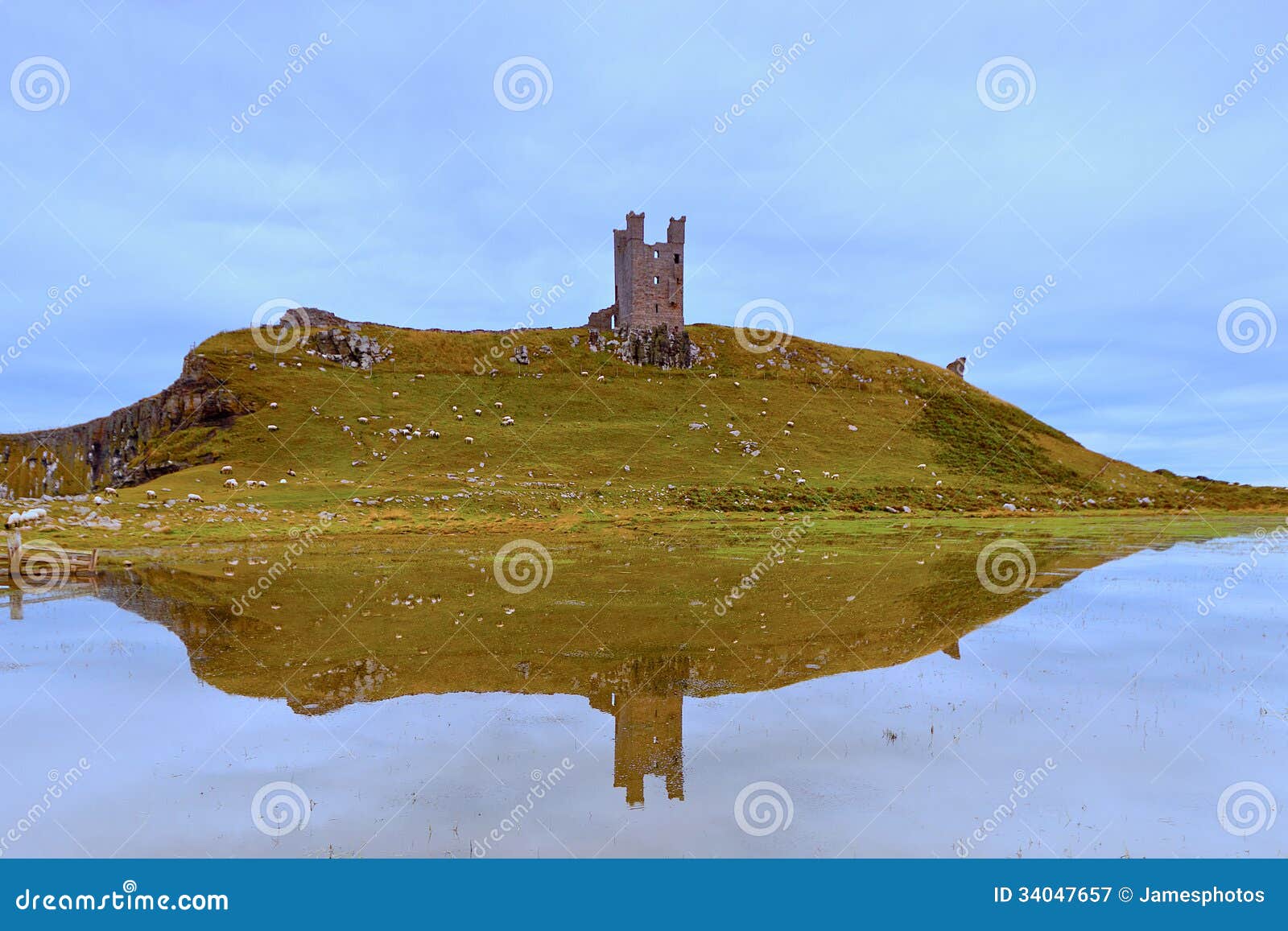 Dunstanburgh Castle Reflection Stock Image - Image of light, atmosphere ...