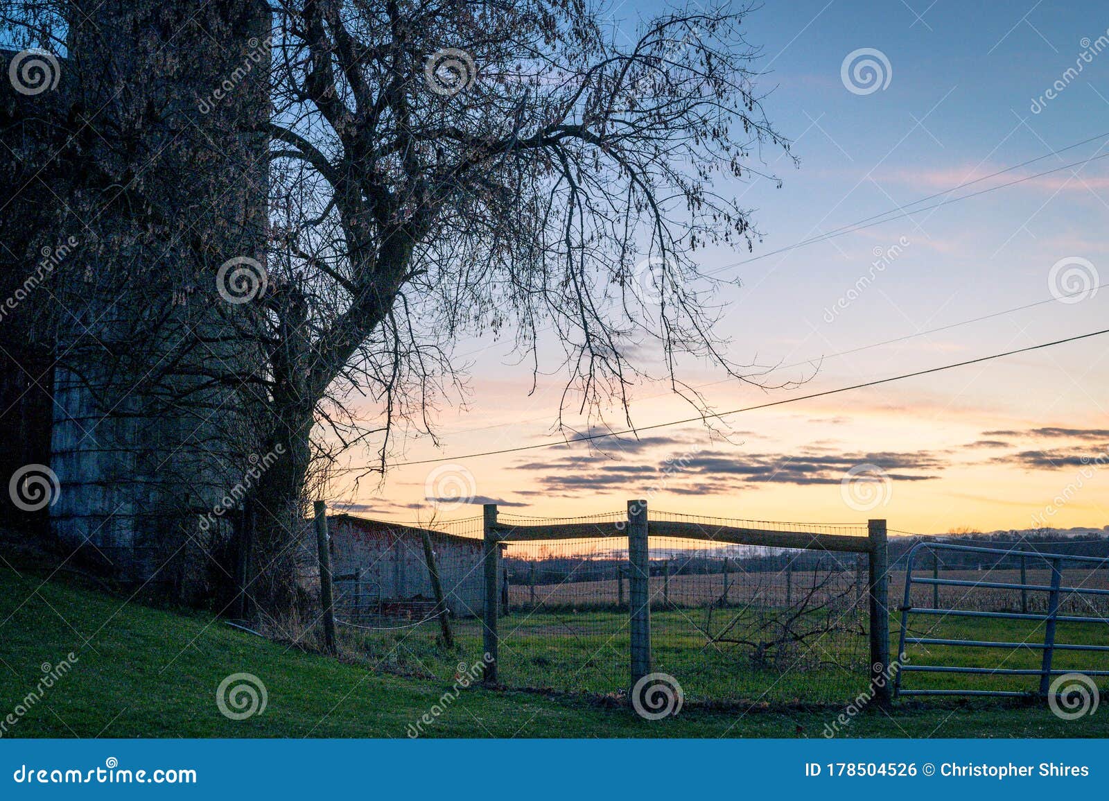 Dusk on a farm stock photo. Image of horizon, field - 178504526
