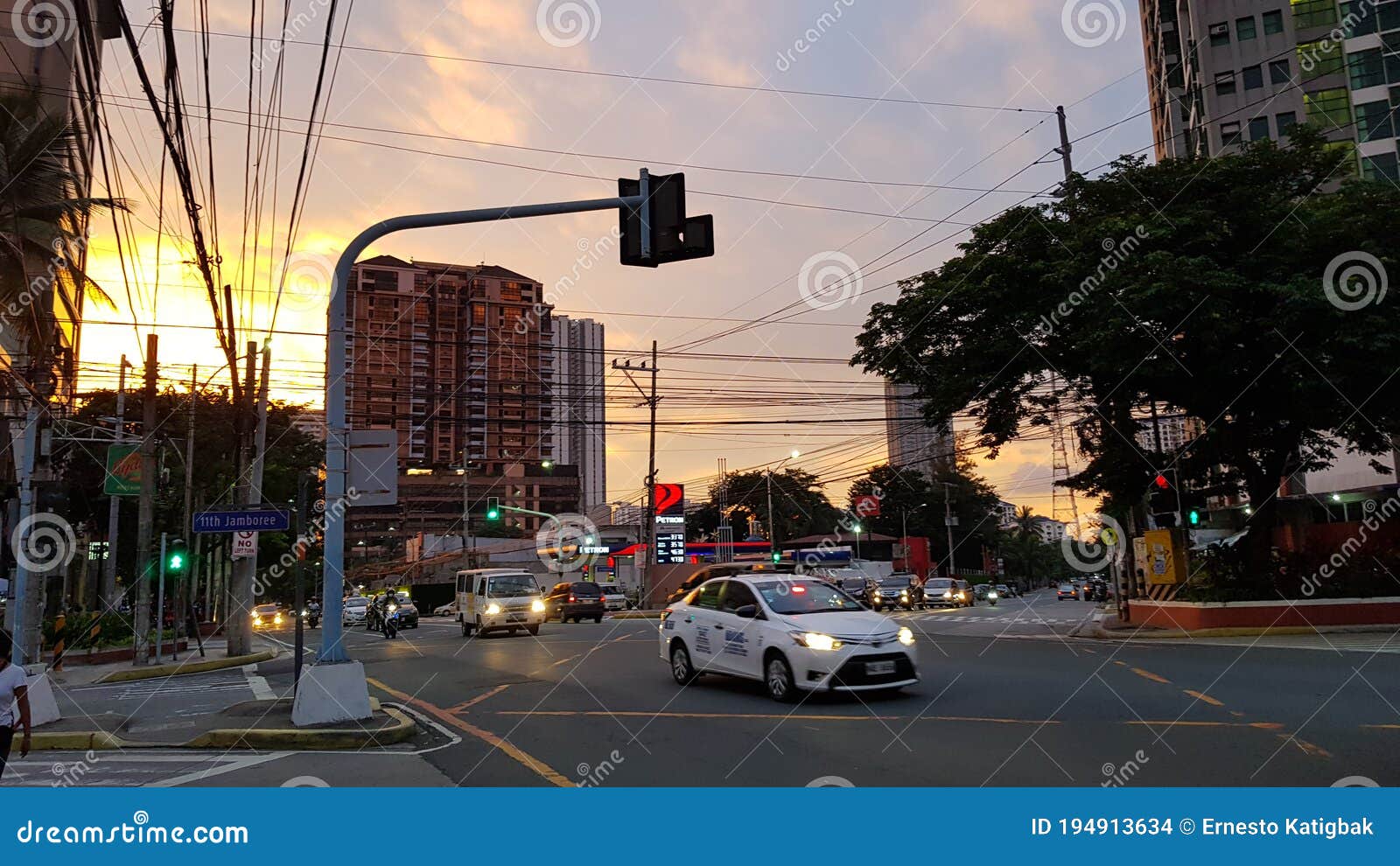 Dusk at an Intersection with a Taxi in Quezon City , Philippines ...
