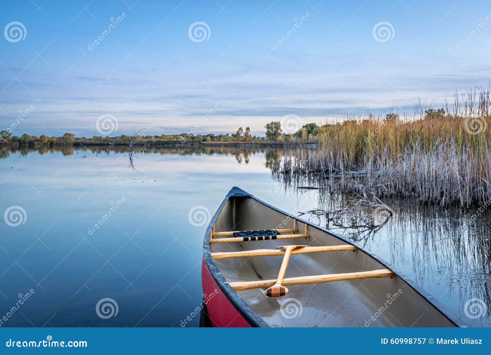 Dusk Over Calm Lake with a Canoe Stock Image - Image of dusk, colorado ...