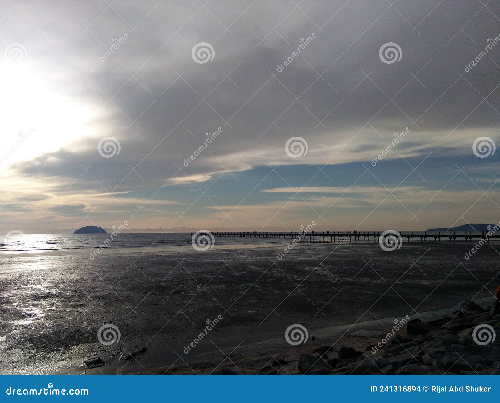 Dusky sunset in Yan stock photo. Image of cloud, coast - 241316894