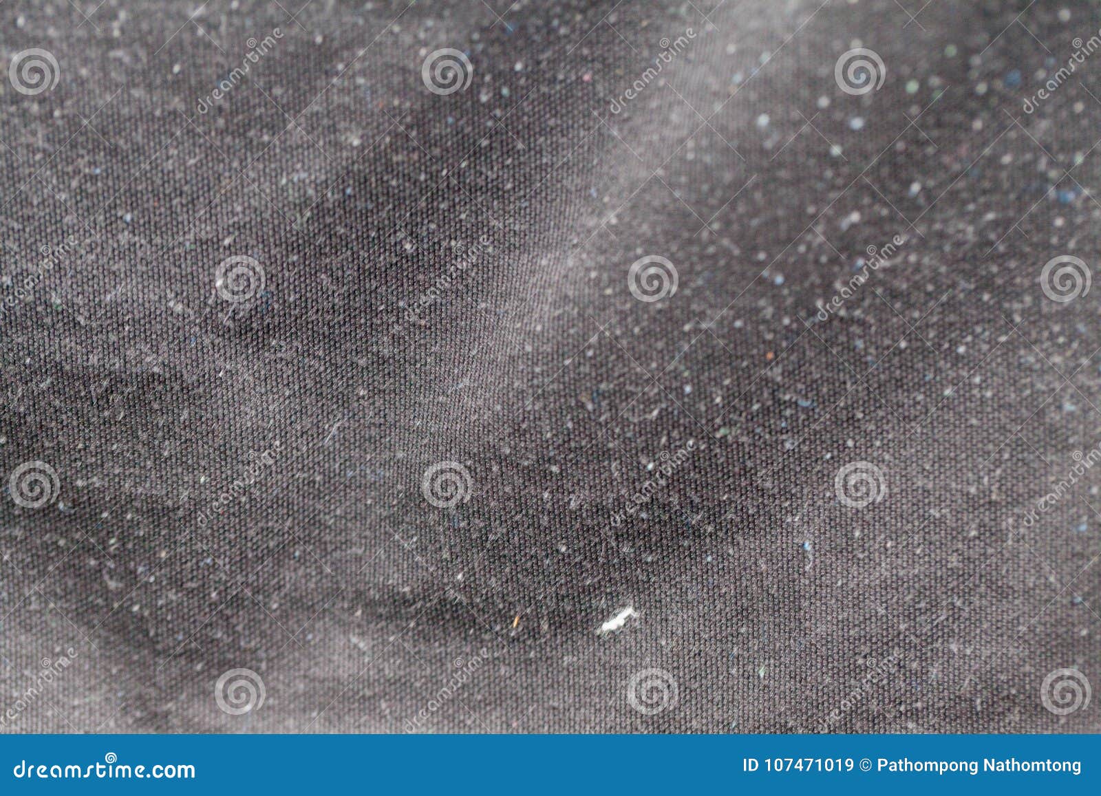 Dust on black shirt stock image. Image of fabric, material - 107471019