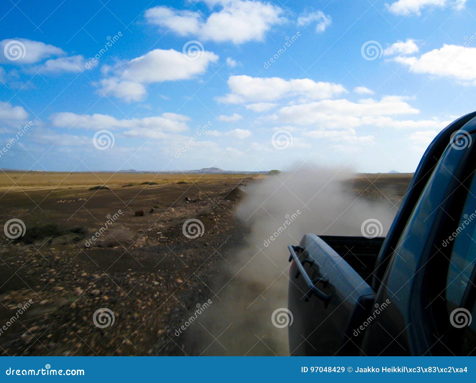 Dust and a car stock image. Image of outback, roadtrip - 97048429