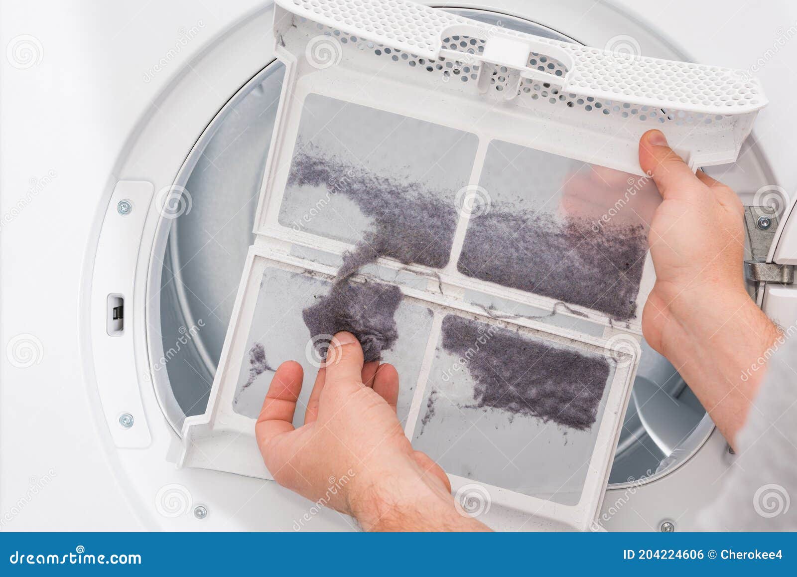 Man Shows Dust and Dirt Trapped by the after Use Clothes Dryer Filter ...