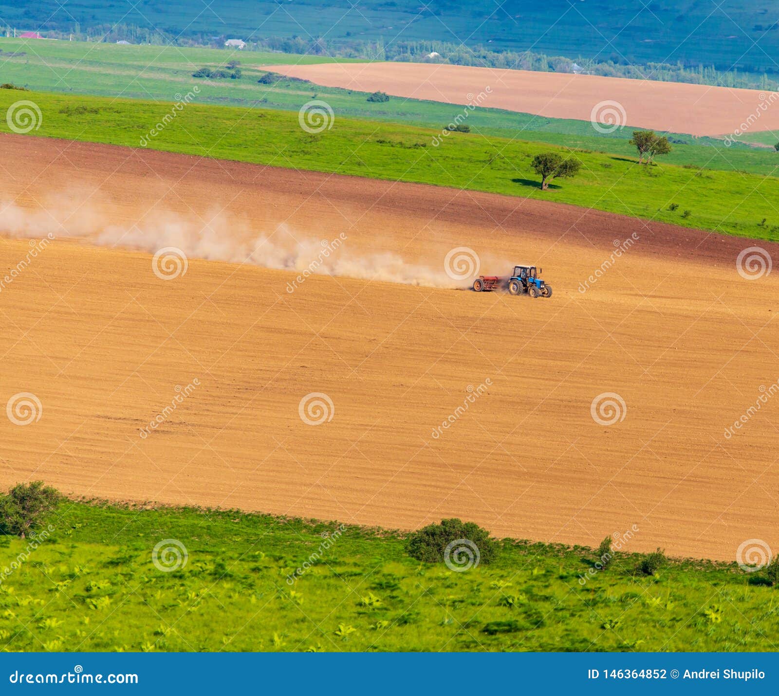 Dust from a Tractor Working in a Field in Spring Stock Photo - Image of ...