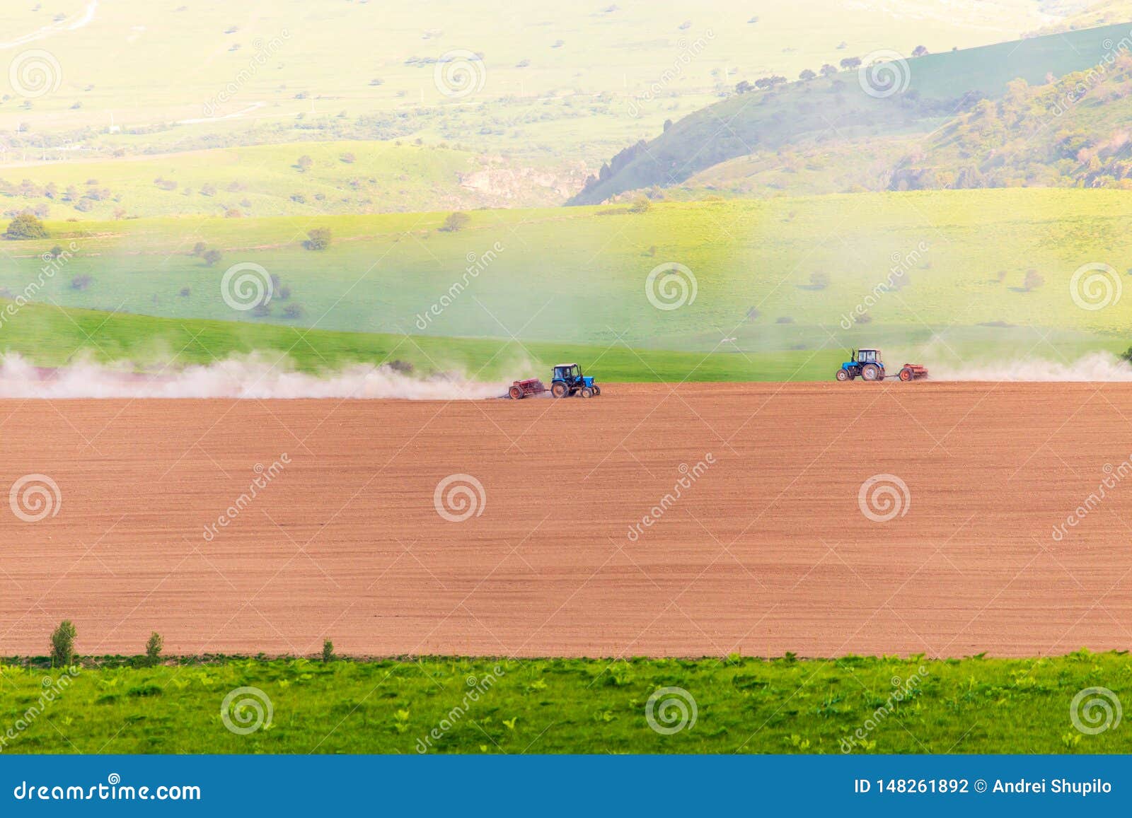 Dust from a Tractor Working in a Field in Spring Stock Photo - Image of ...