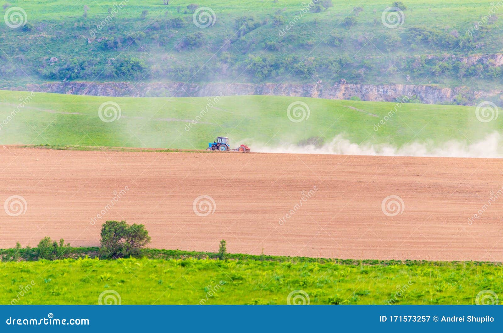 Dust from a Tractor Working in a Field in Spring Stock Image - Image of ...