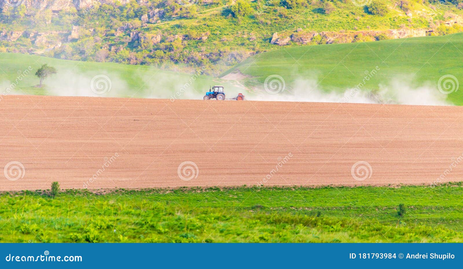 Dust from a Tractor Working in a Field in Spring Stock Photo - Image of ...