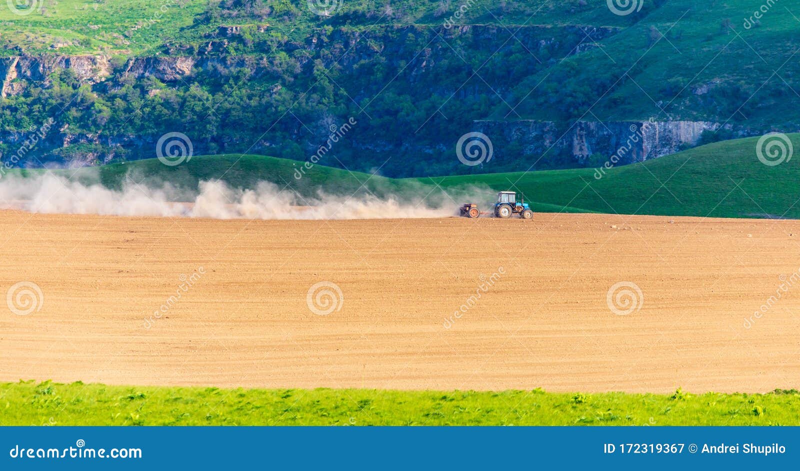 Dust from a Tractor Working in a Field in Spring Stock Image - Image of ...