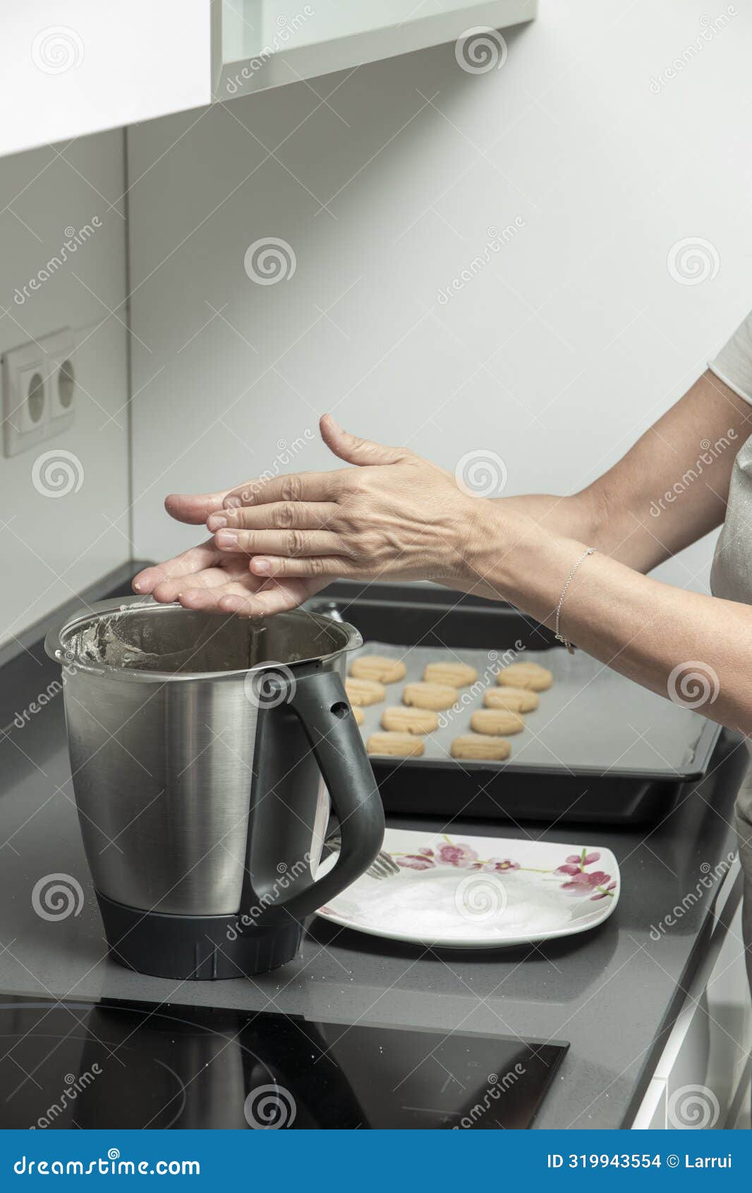 Hands Dusting Flour Over a Kitchen Blender with Cookie Dough ...