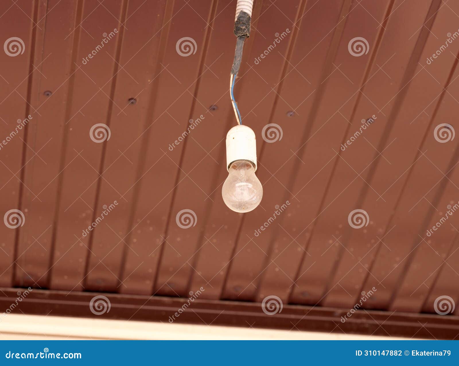 Dusty Light Bulb Hanging from a Ceiling Stock Photo - Image of ...