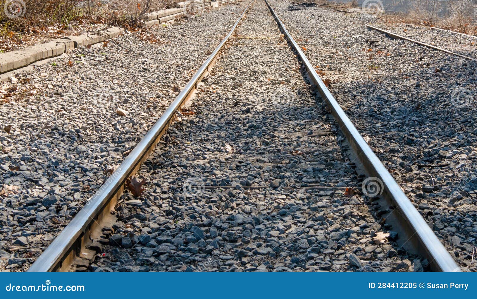 Dusty Old Railway Tracks with Stones and Pebbles Stock Image - Image of ...