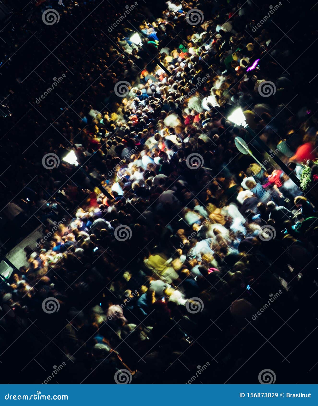 Dutch Angle of Long Exposure of Crowd at Night - High Perspective Stock ...