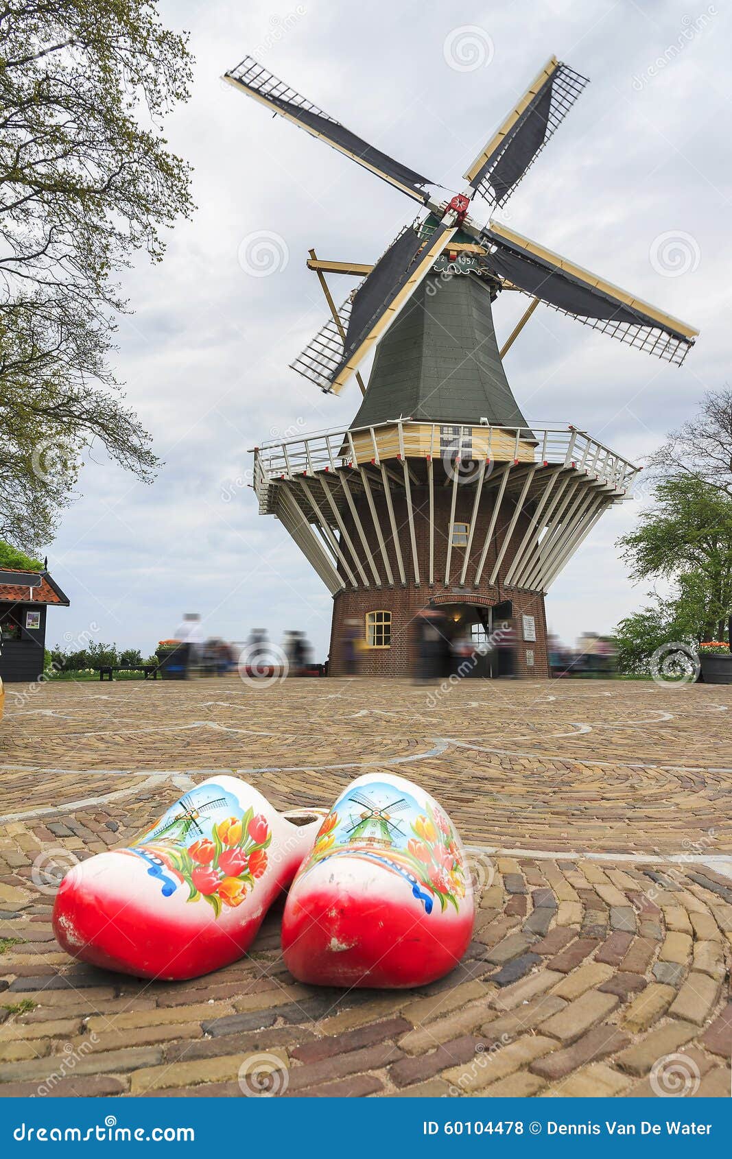 Dutch clogs and a windmill stock photo. Image of europe - 60104478