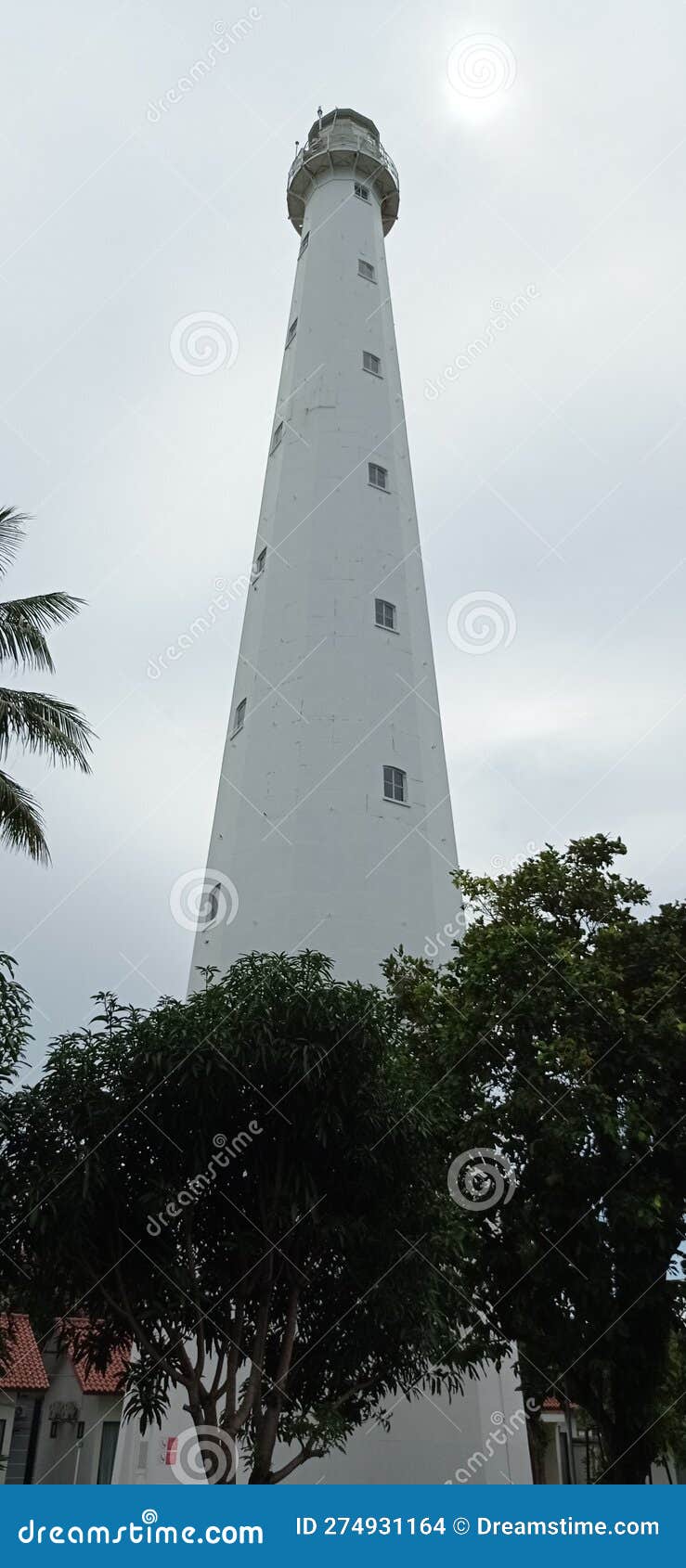 The Dutch Colonial Lighthouse Stock Photo - Image of colonial, tree ...