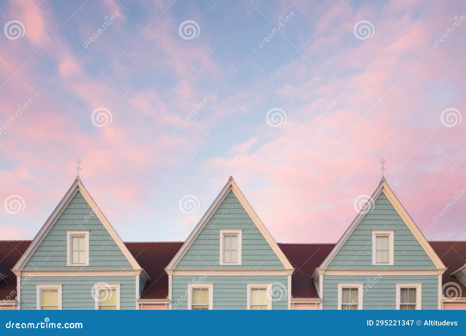Dutch Colonials Flared Eave Against a Backdrop of Pastel Sky Stock ...