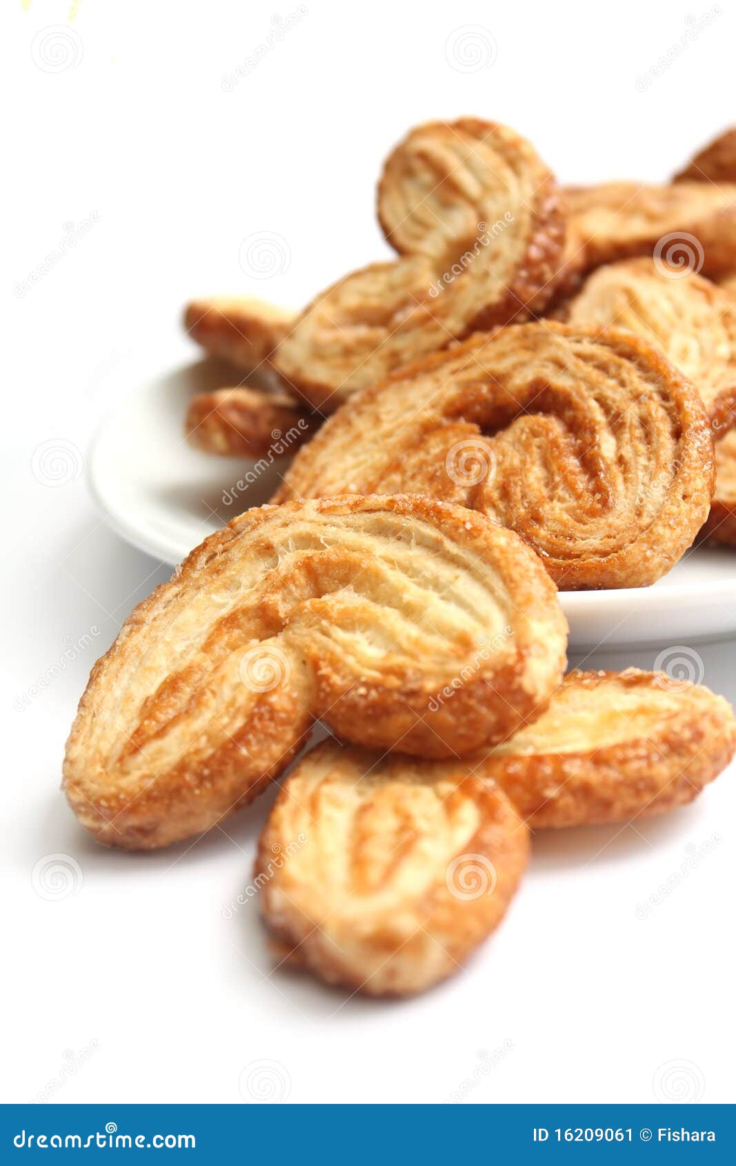 Dutch Cookie on White Plate Stock Image - Image of holland, heart: 16209061