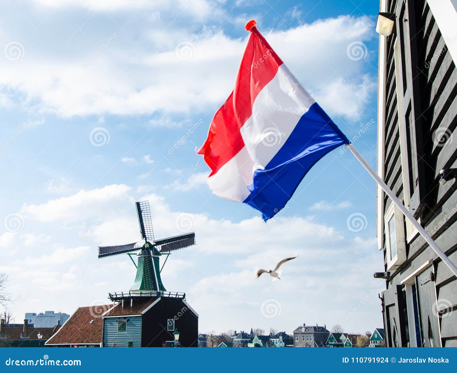 Dutch Flag and Windmill stock photo. Image of house - 110791924