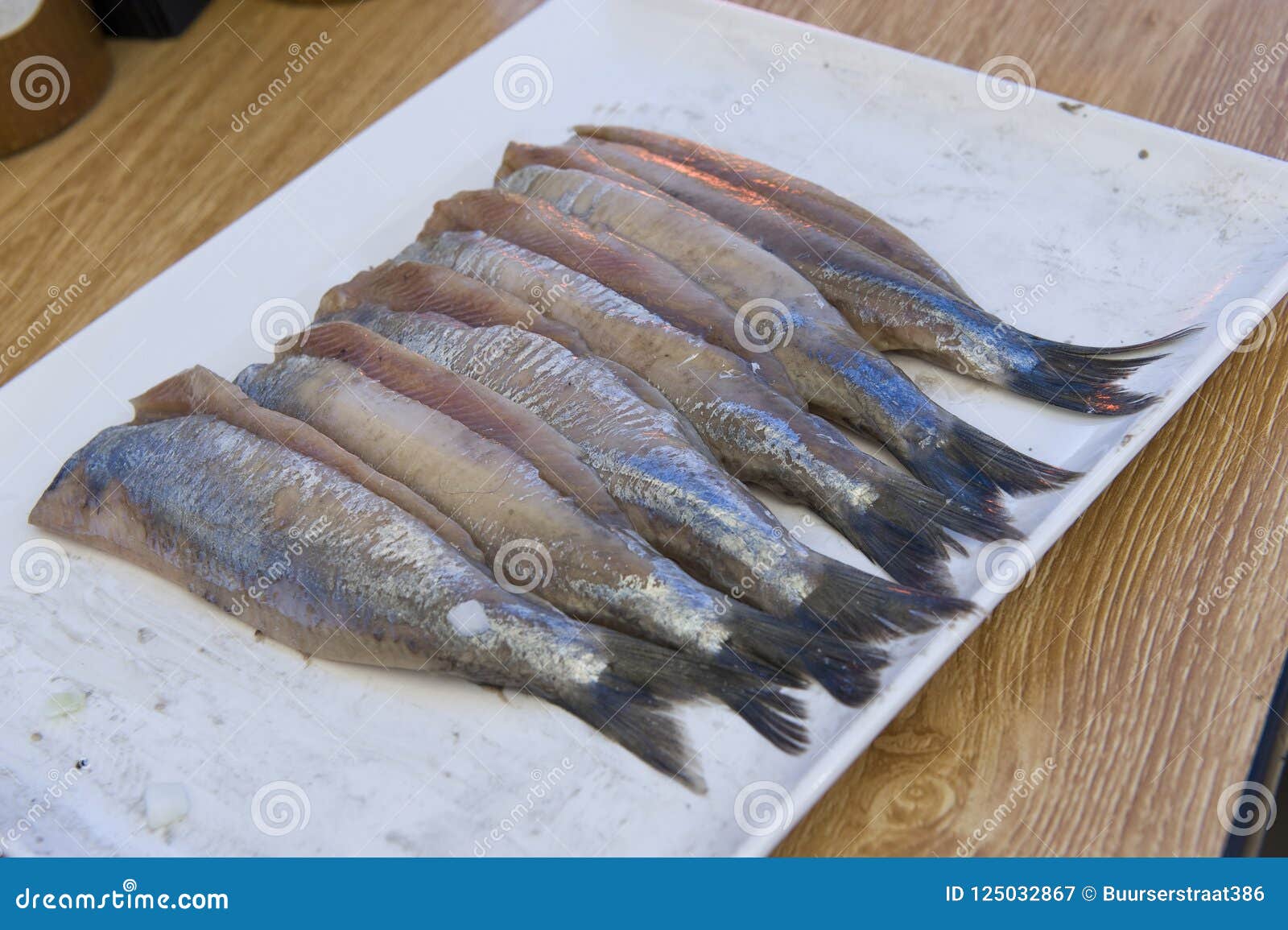 Dutch haring on plate stock image. Image of healthy - 125032867