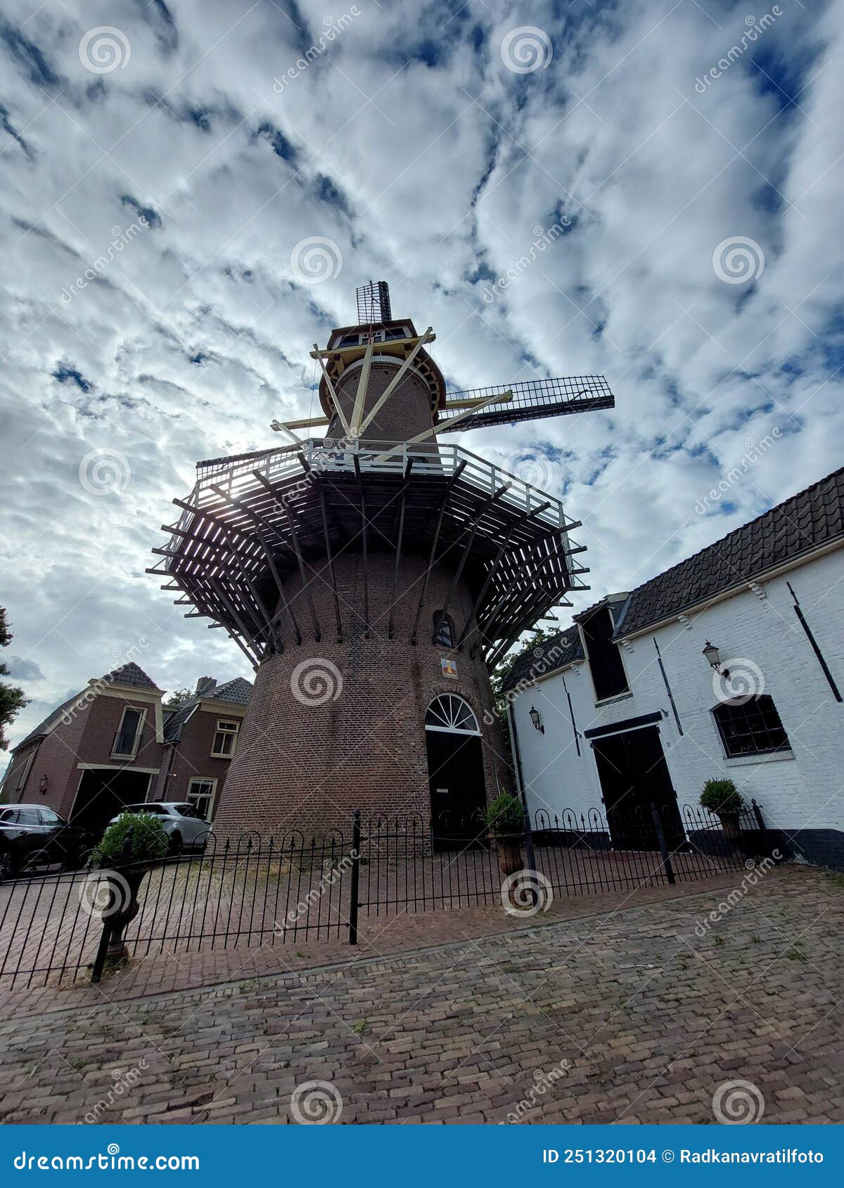 Dutch Mill Standing in the Middle of the Town Stock Photo - Image of ...