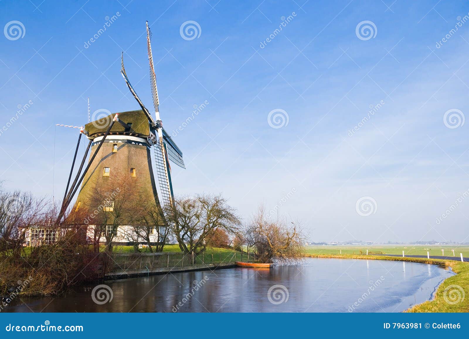 Dutch polder with windmill stock image. Image of water - 7963981