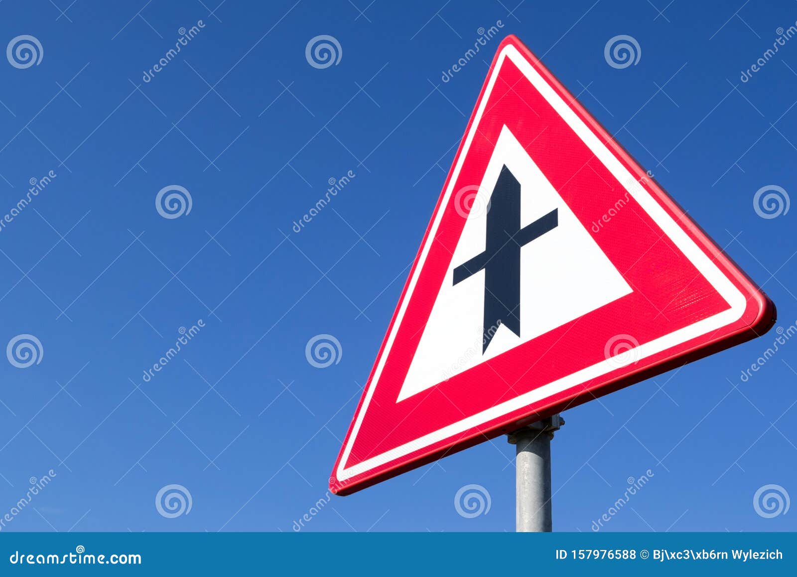 Crossroads with priority stock photo. Image of triangular - 157976588