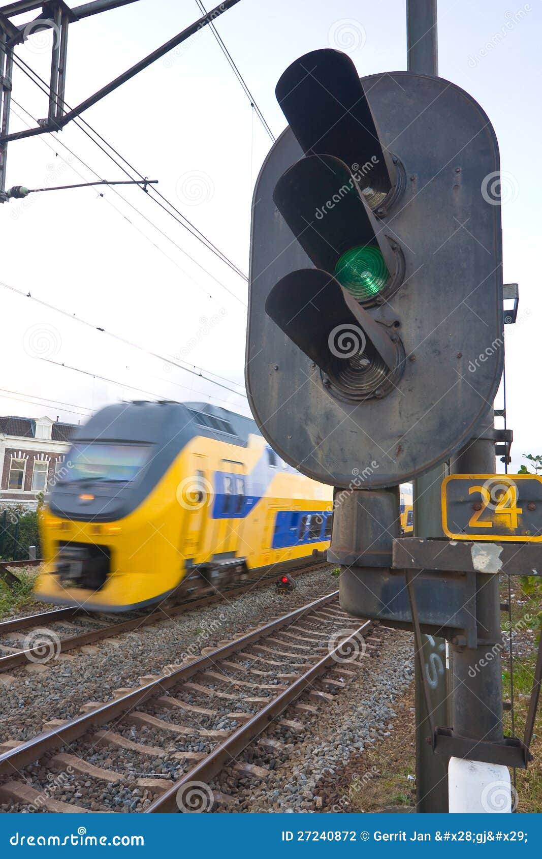 Dutch Train Passing a Railway Sign Stock Photo - Image of cable, iron ...