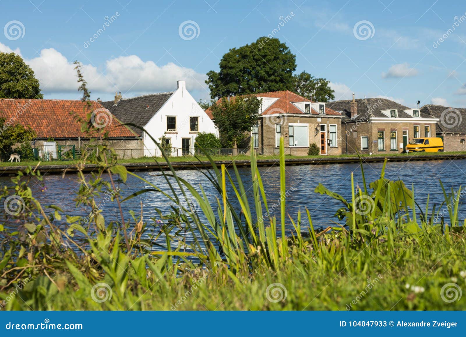 Dutch Typical Houses by the River Bank Stock Image - Image of outdoor ...