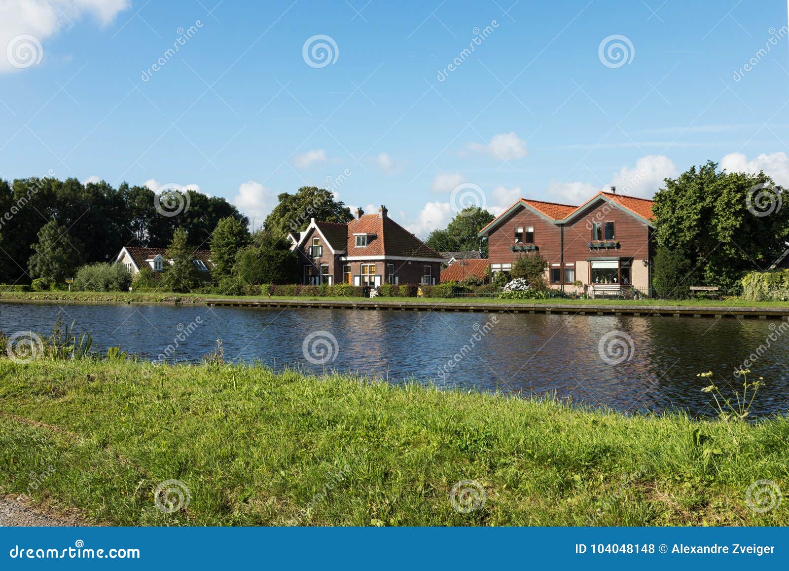 Dutch Typical Houses by the River Bank Stock Photo - Image of village ...