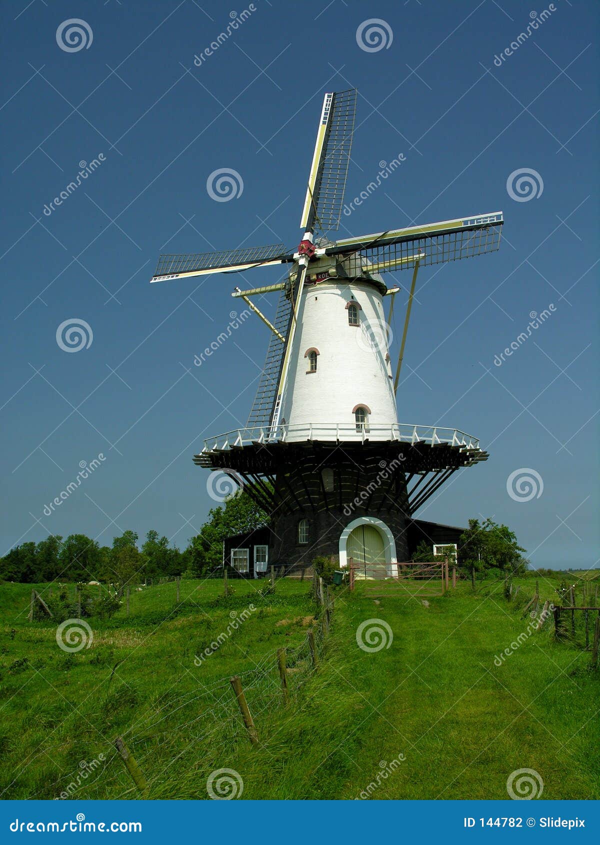 Dutch windmill stock photo. Image of bush, windmill, white - 144782