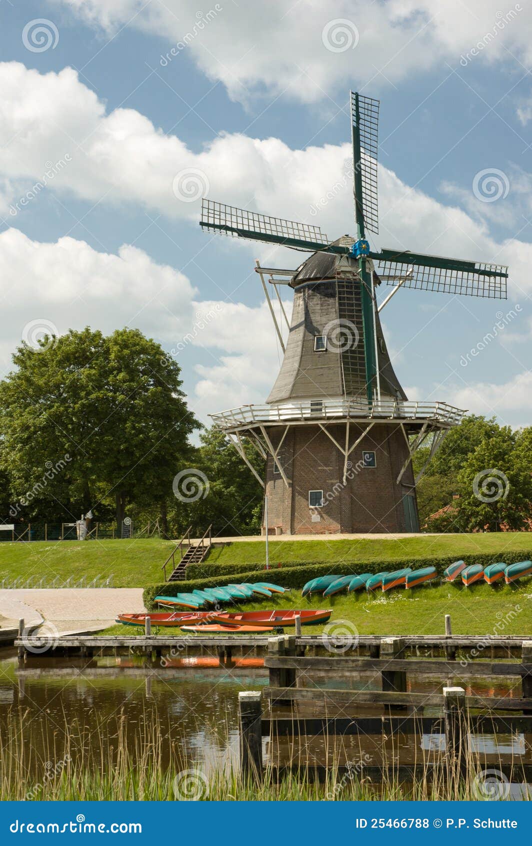 Windmill With Canoes Stock Image | CartoonDealer.com #25466797