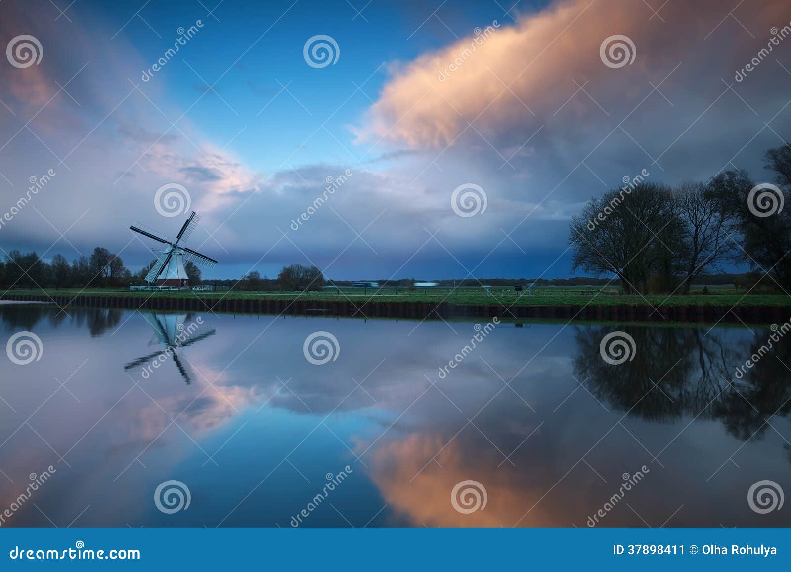 Dutch Windmill at Stormy Sunset Stock Image - Image of outside ...