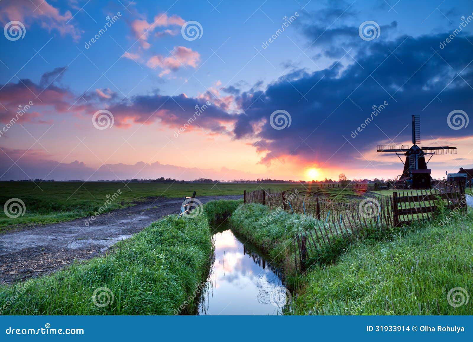Dutch windmill at sunrise stock photo. Image of outdoors - 31933914