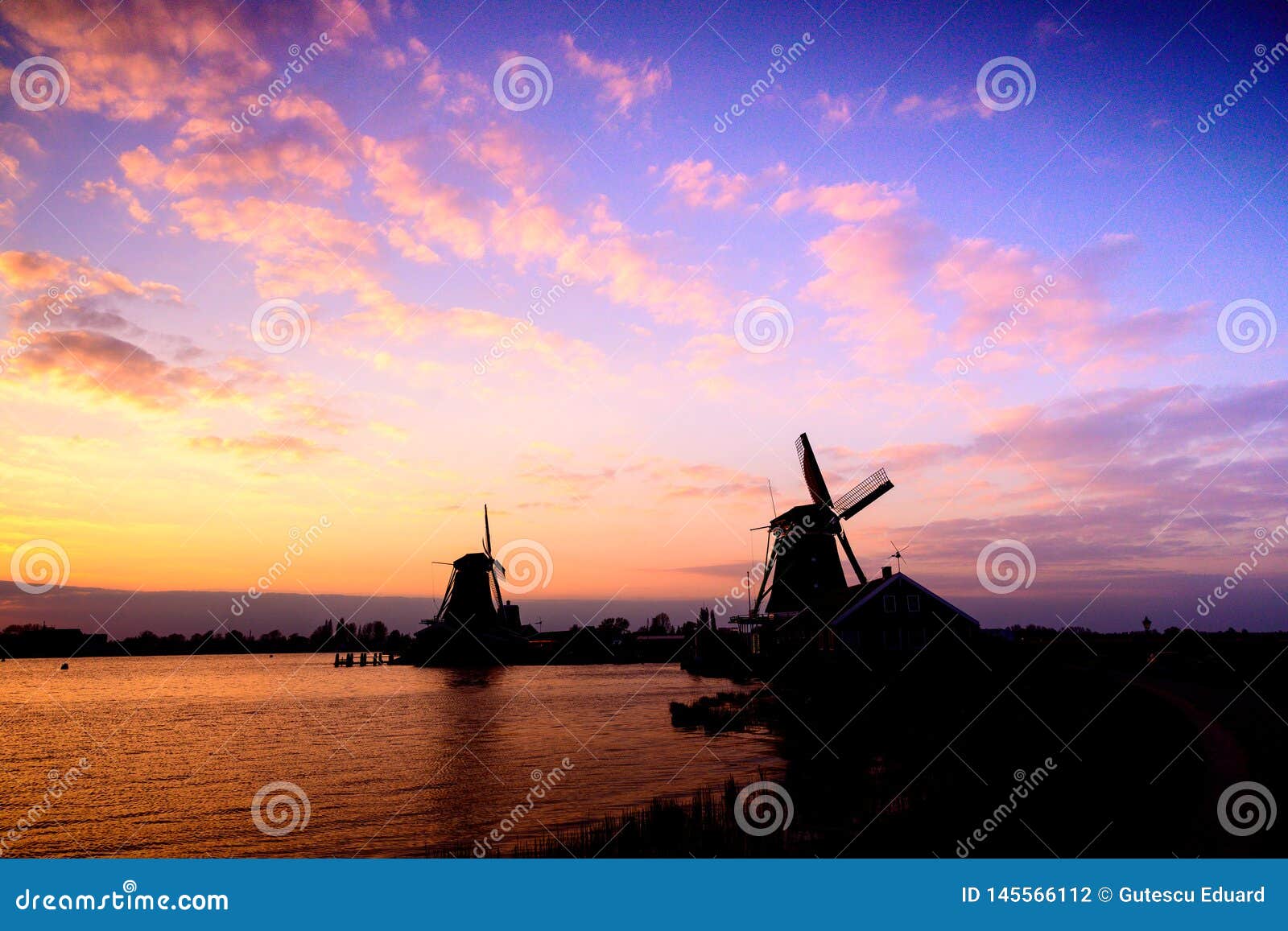Dutch Windmill at Sunset , Netherlands Stock Photo - Image of flying ...