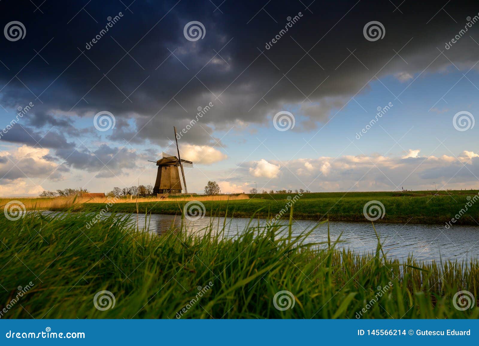 Dutch Windmill at Sunset , Netherlands Stock Photo - Image of classical ...