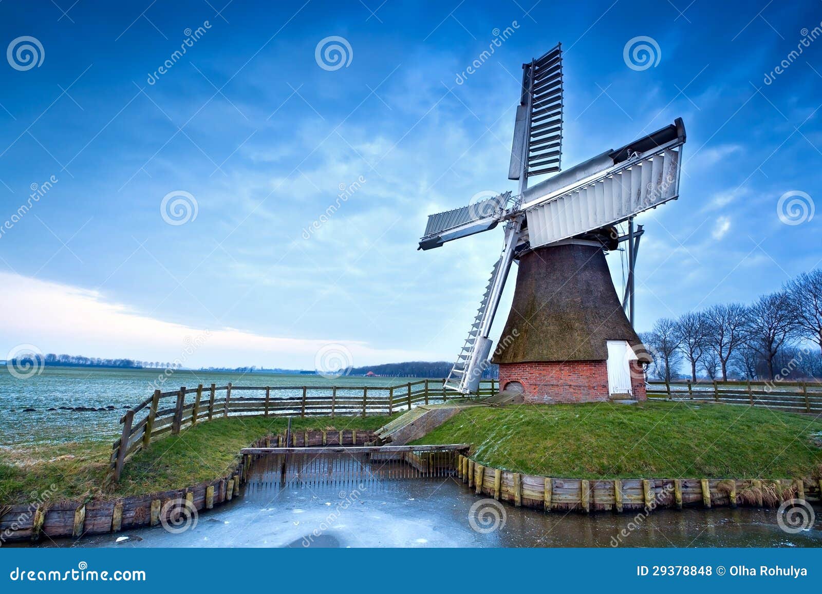 Dutch windmill in winter stock photo. Image of building - 29378848