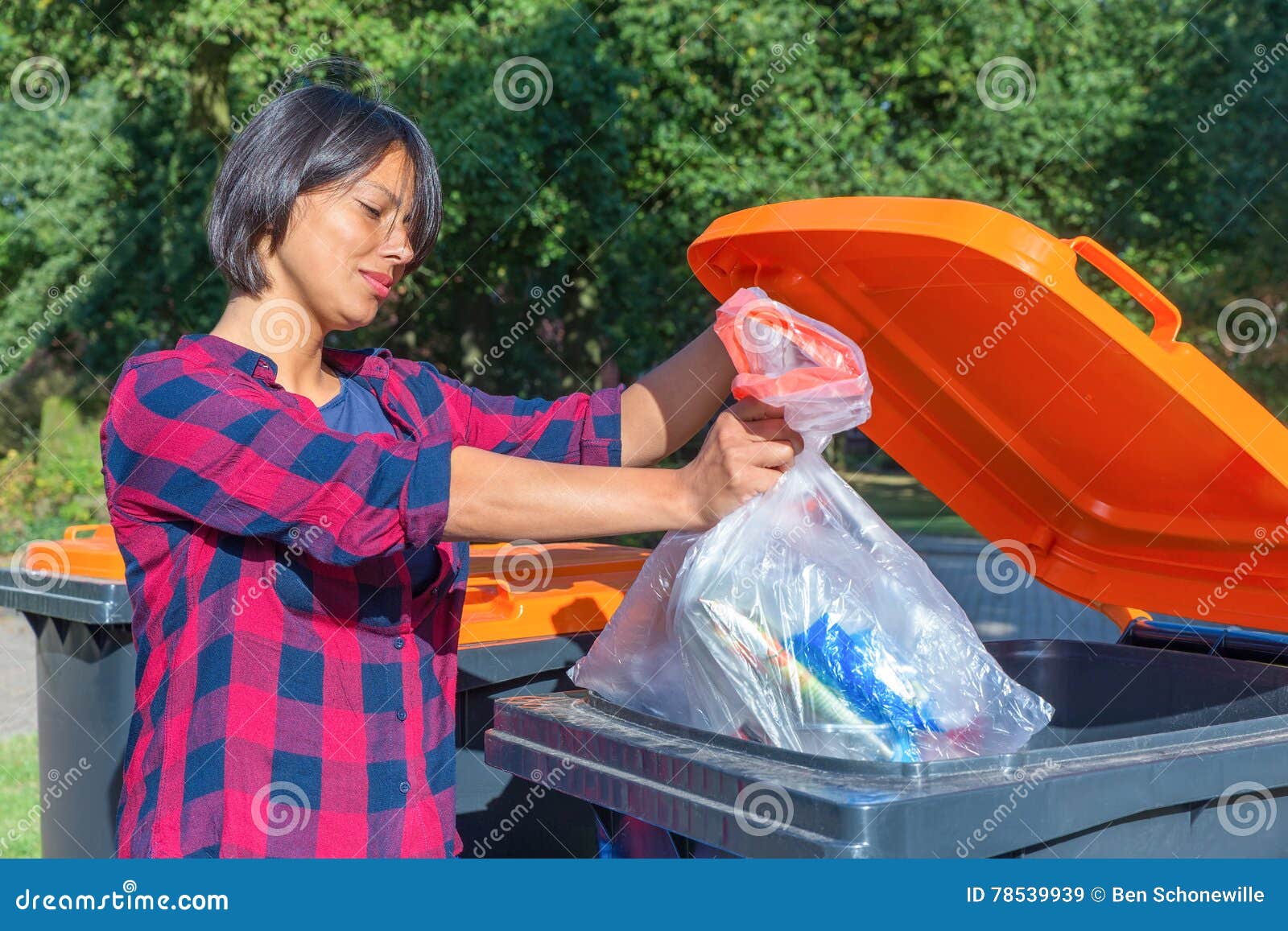 Dutch Woman Throwing Plastic Garbage in Thrash Bin Stock Image - Image ...