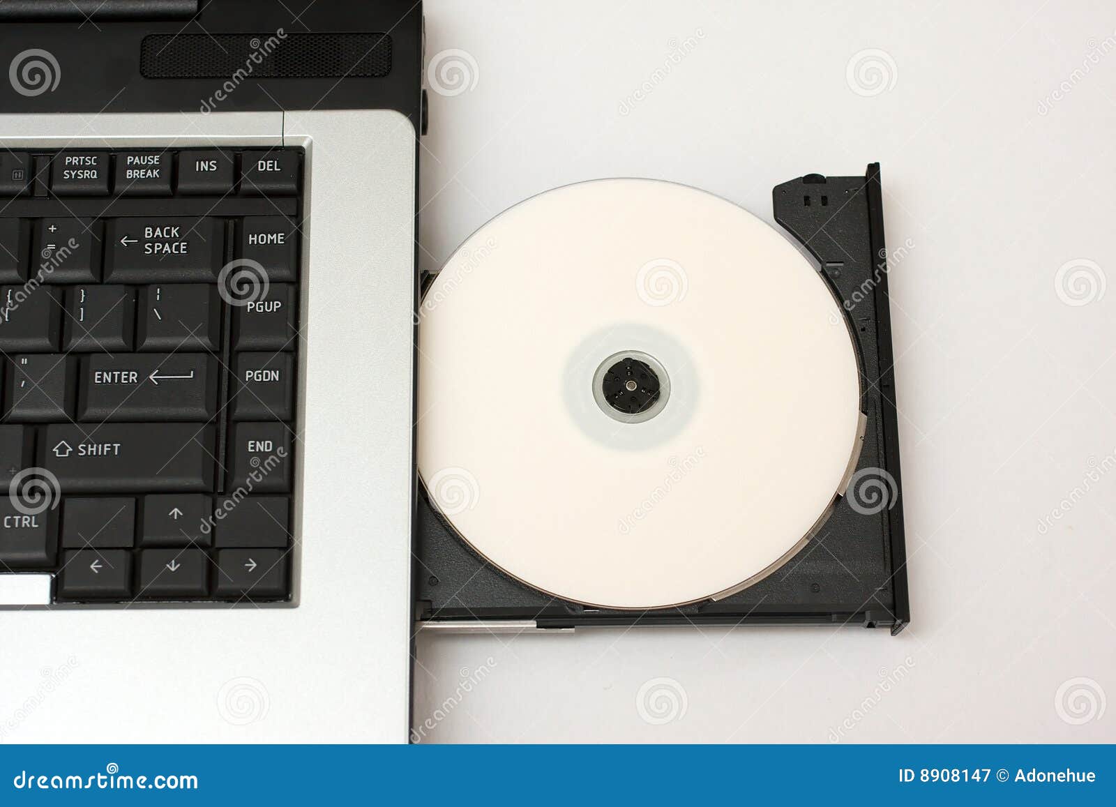 DVD or CD Being Loaded into Laptop Stock Image - Image of white, copy ...