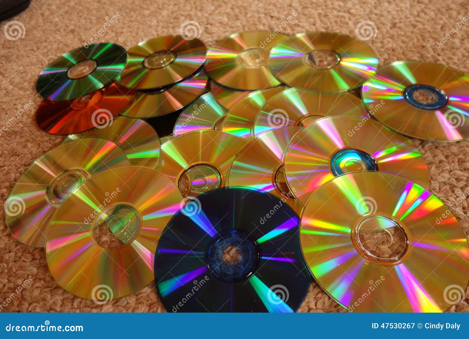 DVD and CD Discs Showing Colorful Backsides. Stock Image - Image of ...