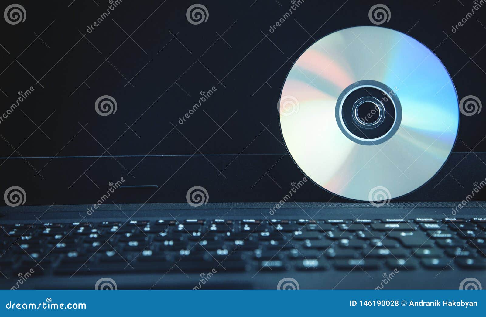 DVD Disk on the Laptop Keyboard Stock Photo - Image of black, storage ...