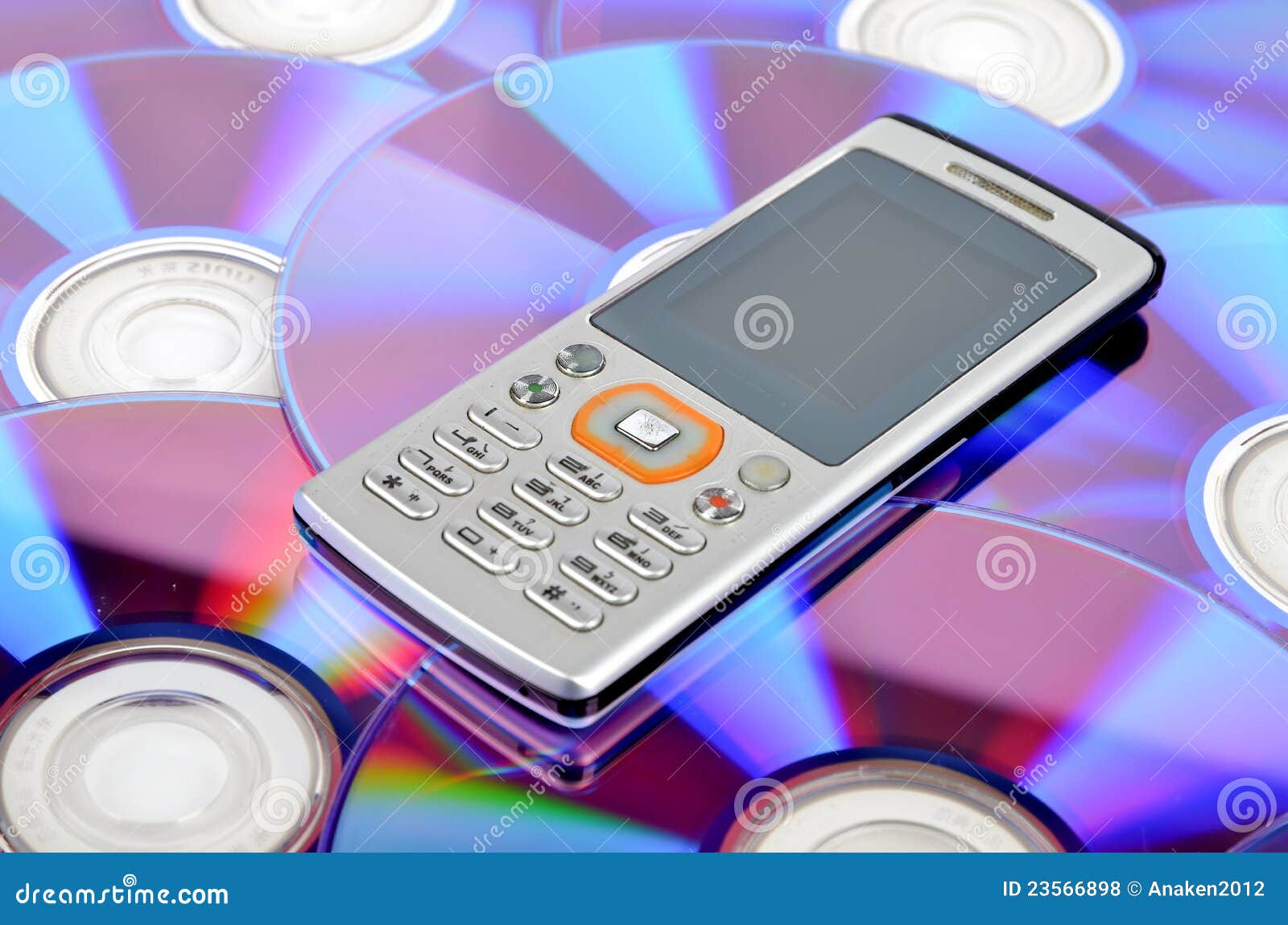 DVD and mobile phone stock photo. Image of keypad, computer - 23566898